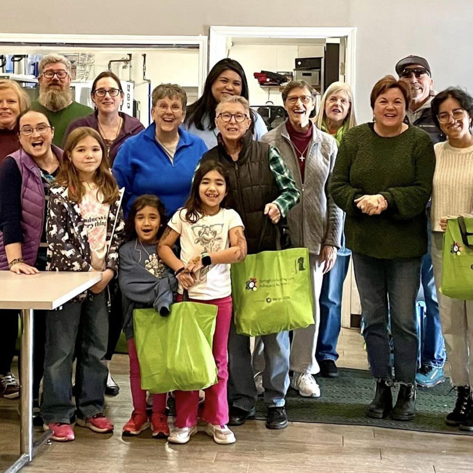 Several Cor Unum members volunteer to prepare baskets of fresh healthy ...